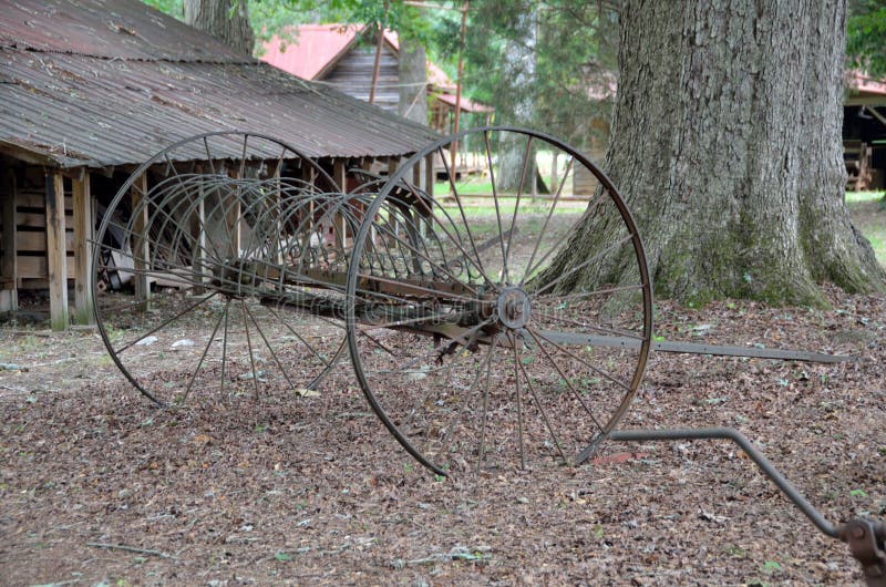 Hay rake in farmyard stock image. Image of rustic, tree - 42543937