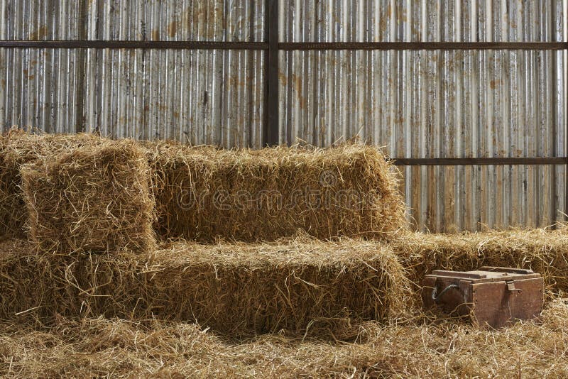 Hay stacks in barn house stock image. Image of beam - 129185319