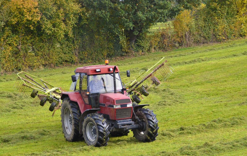 Haymaking stock photo. Image of supply, farmland, tractor - 27810668