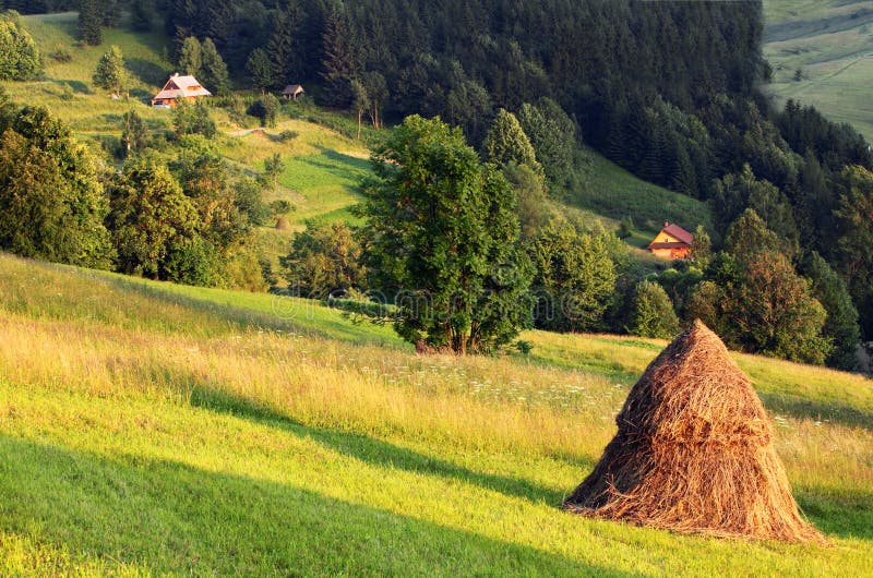 Landscape with hay stack stock image. Image of season - 16262711