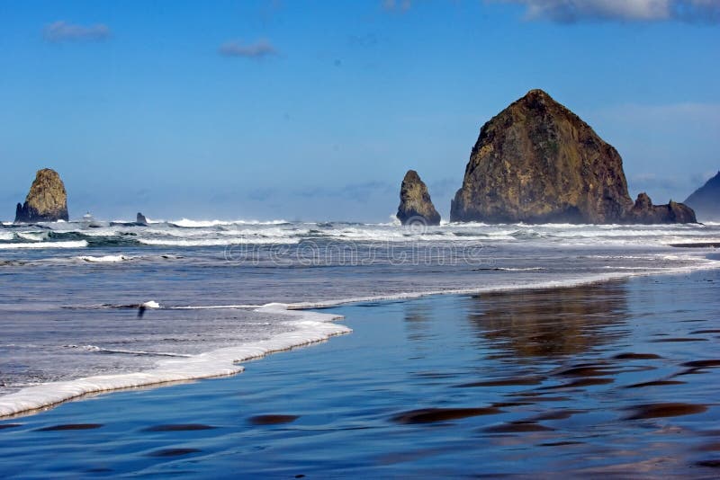 Haystack Rock stock photo. Image of peaceful, waves, oregon - 37344498