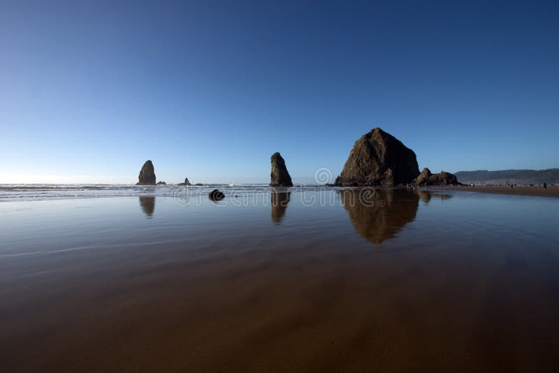 Haystack Rock. stock photo. Image of monolith, rock, coast - 80792