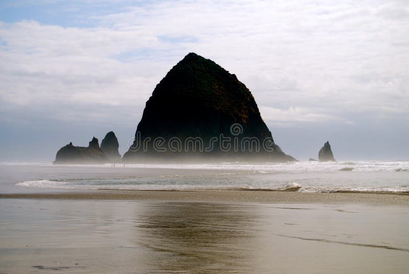 Haystack Rock Reflection Low Tide Stock Photo - Image of horizontal ...