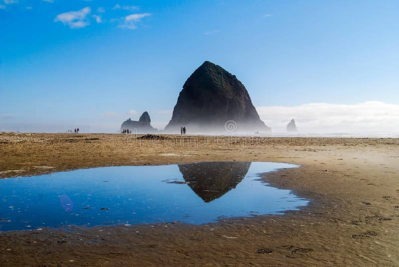 Haystack Rock Cannon Beach Mirror Reflection Ocean Water Stock Photo ...