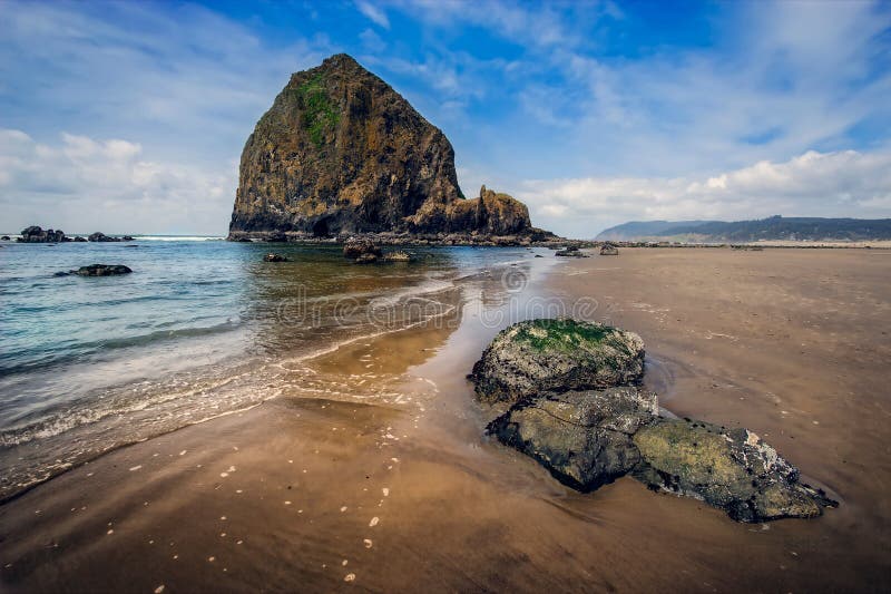 Haystack Rock at Low Tide stock image. Image of coast - 16067695