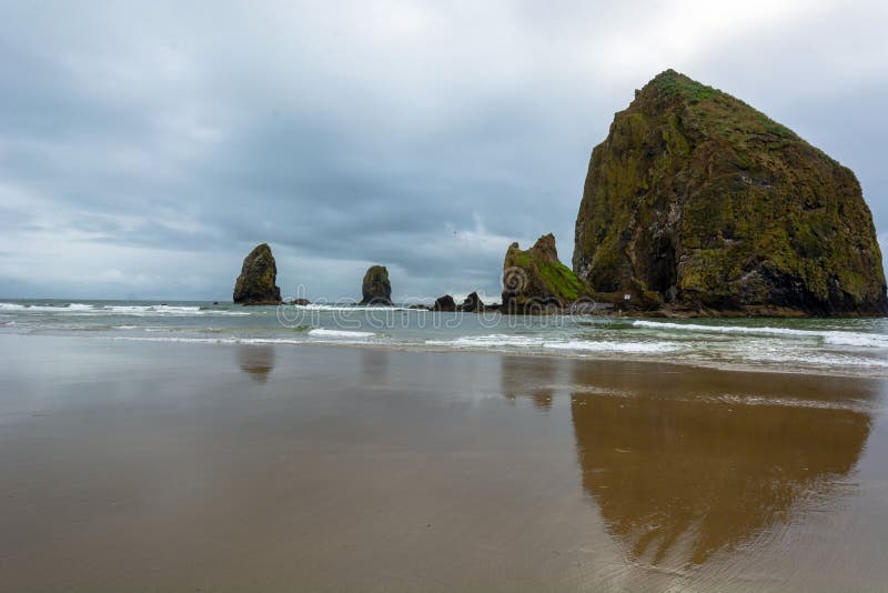 Haystack Rock in the Cannon Beach in Oregon, USA Stock Image - Image of ...