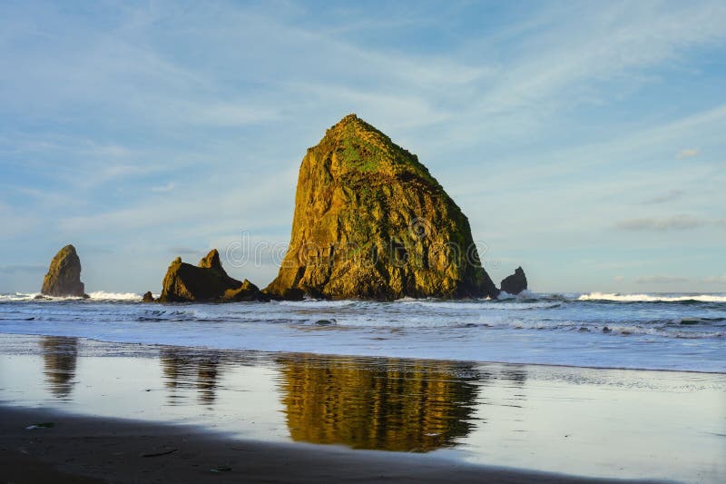Haystack Rock at Cannon Beach Reflection. Stock Illustration ...