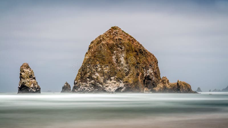 Haystack Rock Oregon stock image. Image of beauty, waves - 78886519