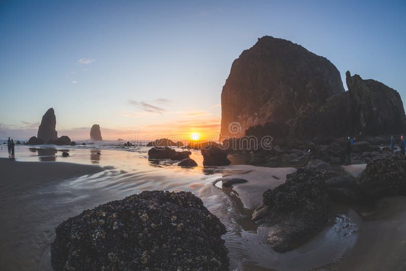 Sunset at Haystack Rock in Cannon Beach, Oregon Stock Image - Image of ...