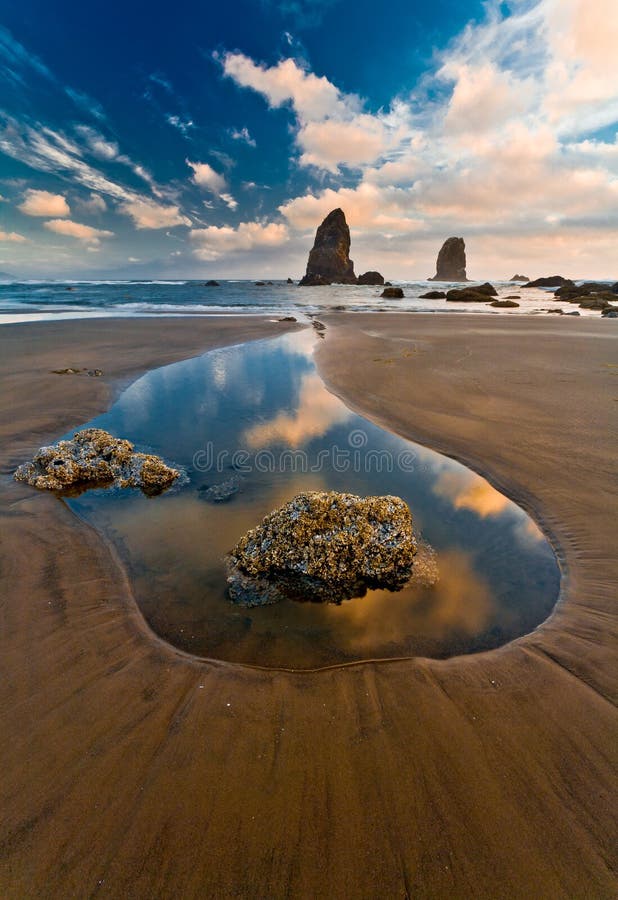 Haystack Rock stock image. Image of sandy, sand, waves - 37351773