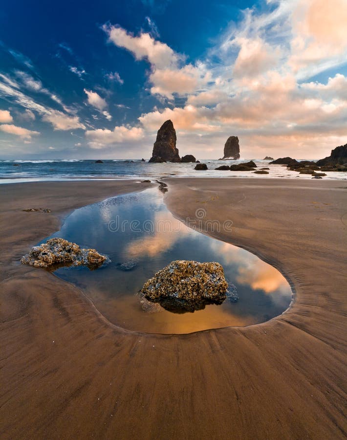 Haystack Rock stock image. Image of sandy, sand, waves - 37351773