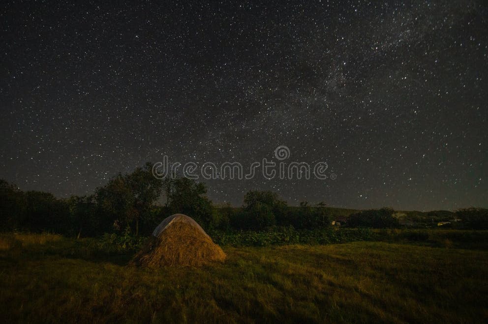 A Haystack Under a Dark Starry Night Sky Stock Photo - Image of dark ...