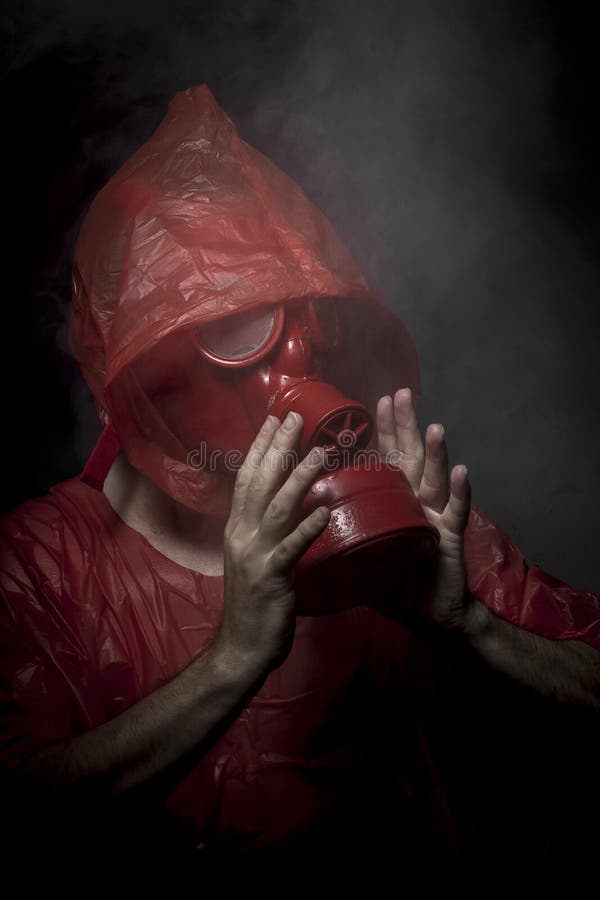Hazard, a Man in a Gas Mask Over the Smoke. Black Background an Stock ...