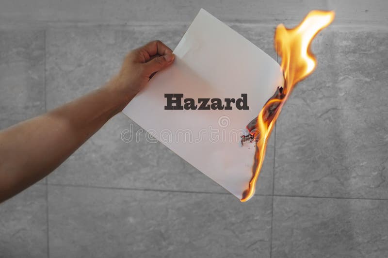 Hazard Text on Burning Paper Stock Photo - Image of road, stop: 148736758