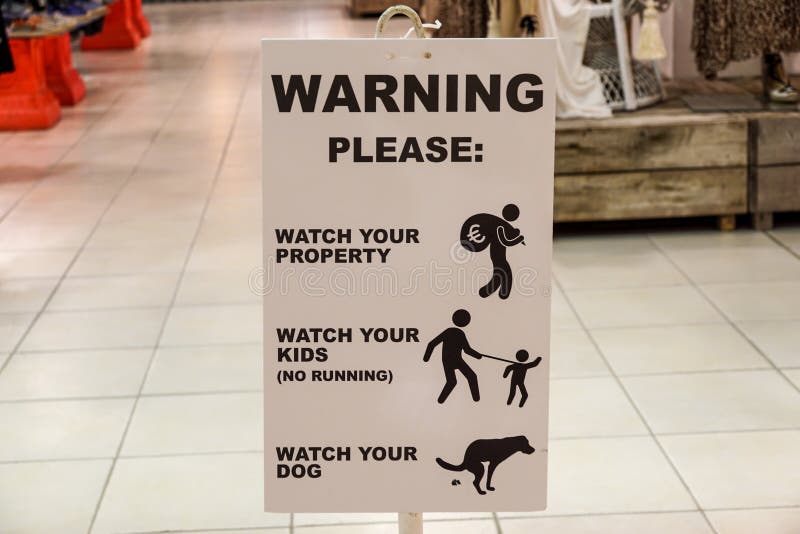 Hazard Warning Attention Sign Inside at Store Stock Photo - Image of ...
