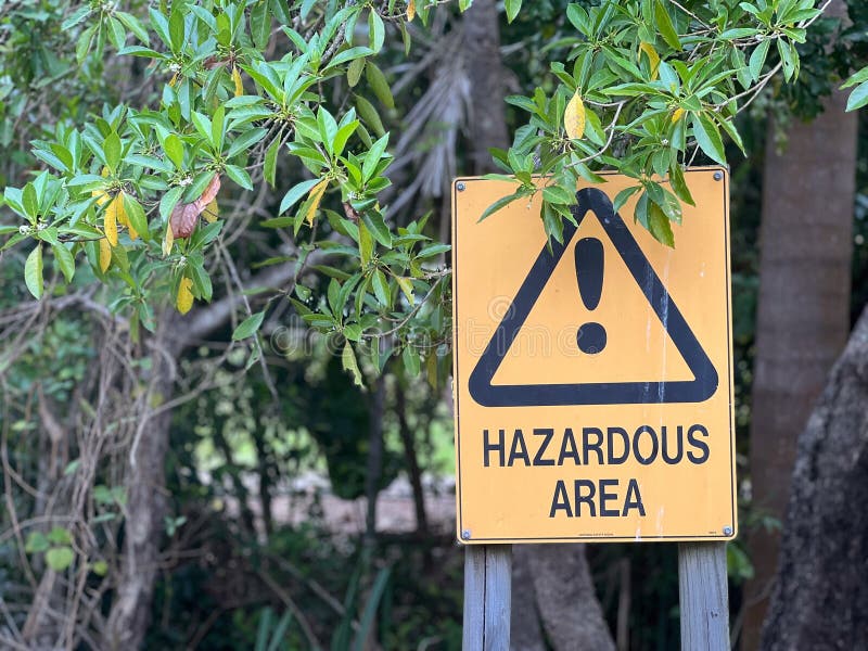 Hazardous Area Warning Sign in a Rainforest Stock Image - Image of ...