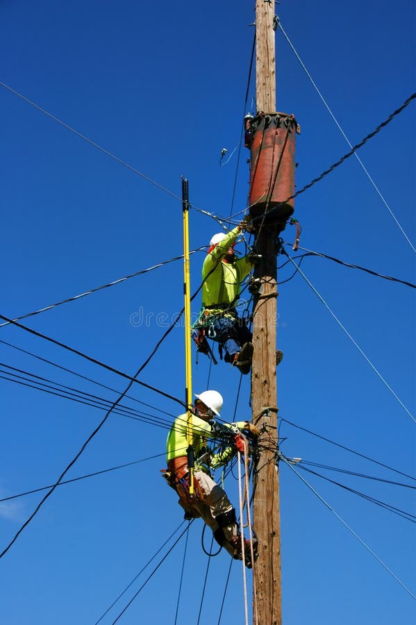 Hazardous line work stock photo. Image of lineman, electricity - 125373448