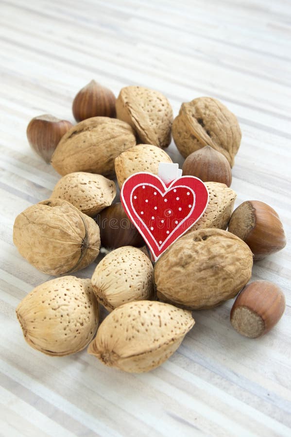 Hazel Nuts in Hard Shells, Pile on Wooden Table Stock Photo - Image of ...