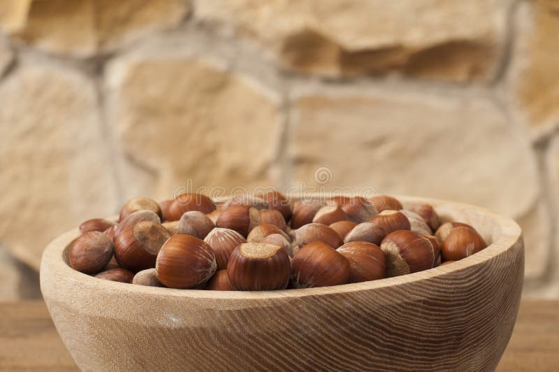 Hazelnut in a bowl stock photo. Image of healthy, bowl - 41530966