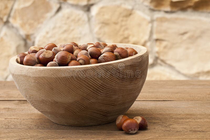 Hazelnut in a bowl stock image. Image of objects, nucleus - 41531151