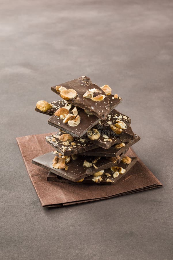 Hazelnut dark chocolate stock photo. Image of dessert - 152633762