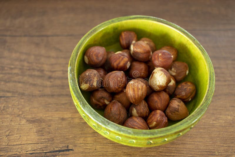 Hazelnut Kernels Isolated on Wooden Surface. Stock Image - Image of ...
