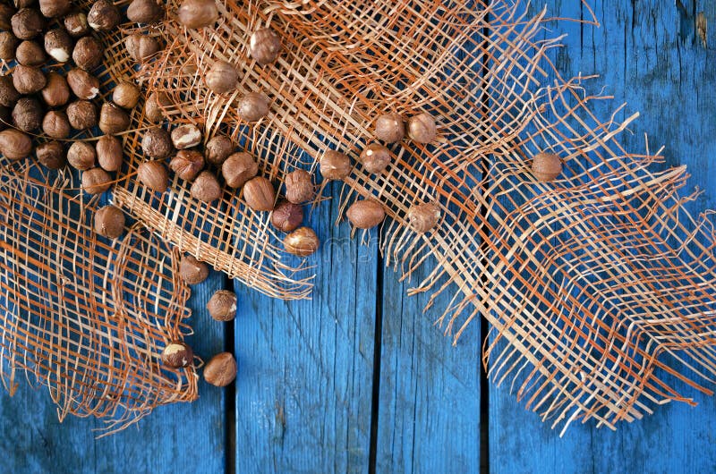 Hazelnuts on Blue Rustic Table with Decoration on it Stock Photo ...