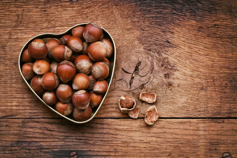 Hazelnuts in Bowl Shape Heart Stock Image - Image of bowl, cracked ...