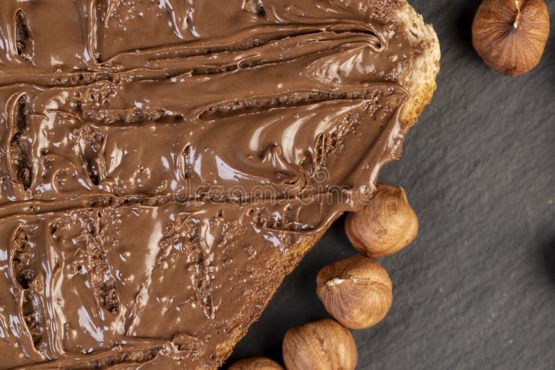 Hazelnuts and Bread with Nut Paste with Chocolate Stock Photo - Image ...