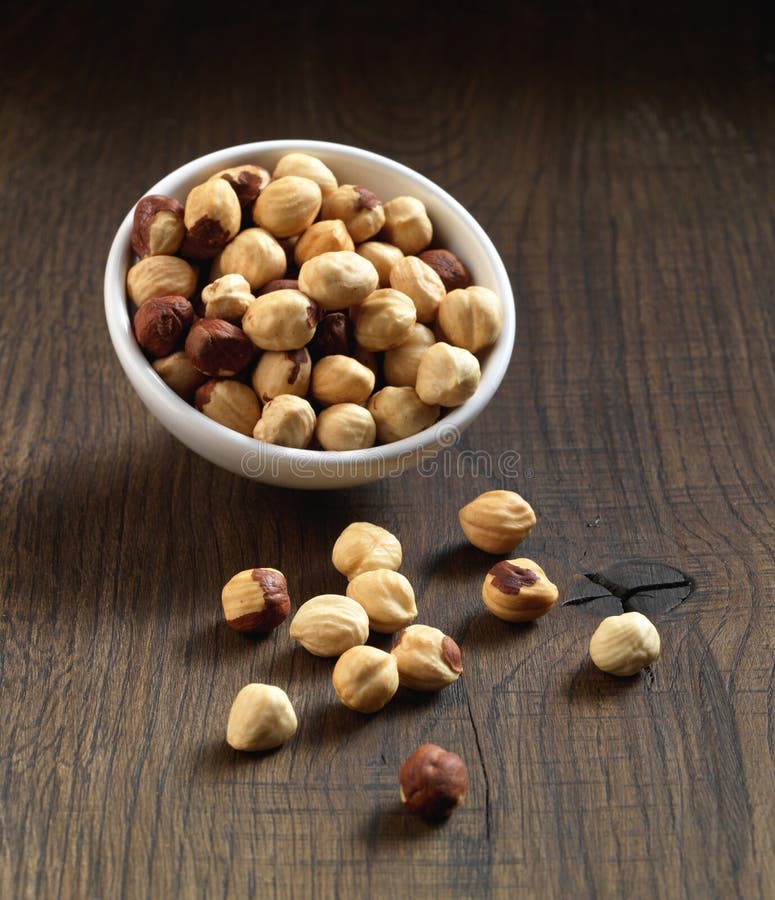 Hazelnuts on Brown Wooden Table Stock Image - Image of healthy ...