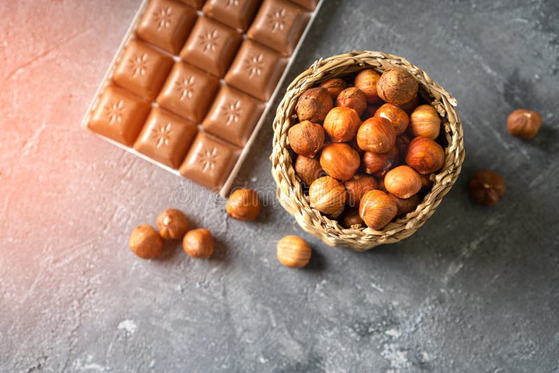 Hazelnuts and Chocolate on the Table. Stock Image - Image of natural ...