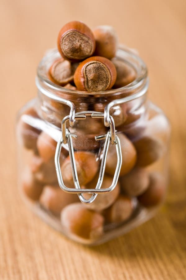 Hazelnuts in a glass jar stock image. Image of healthy - 22804811