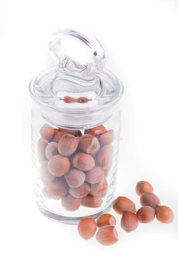 Hazelnuts in Glass Jar on a White Background. Isolated. Dried Nuts ...