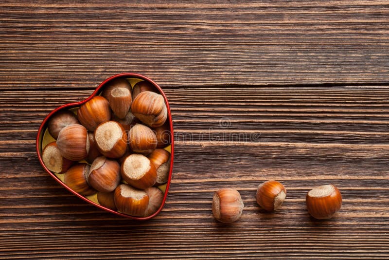 Hazelnuts in a Heart Shaped Tin Can Stock Photo - Image of healthy ...