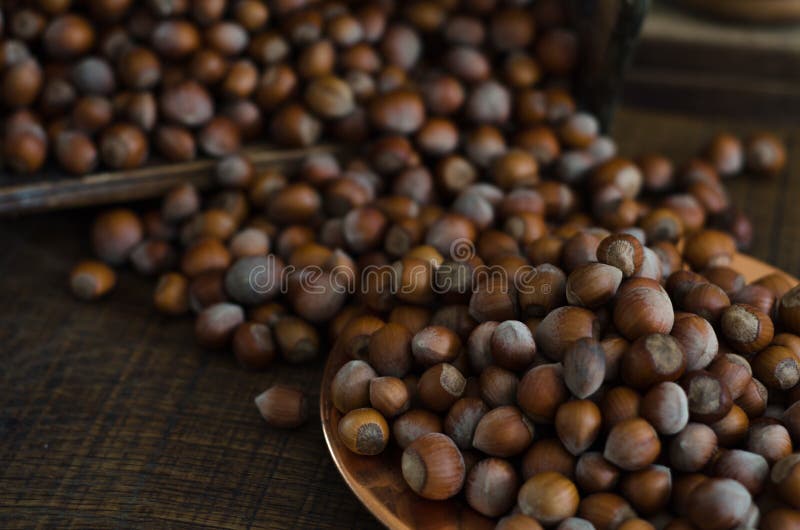 Hazelnuts in Motion Tumbling into Wooden Box Stock Image - Image of ...