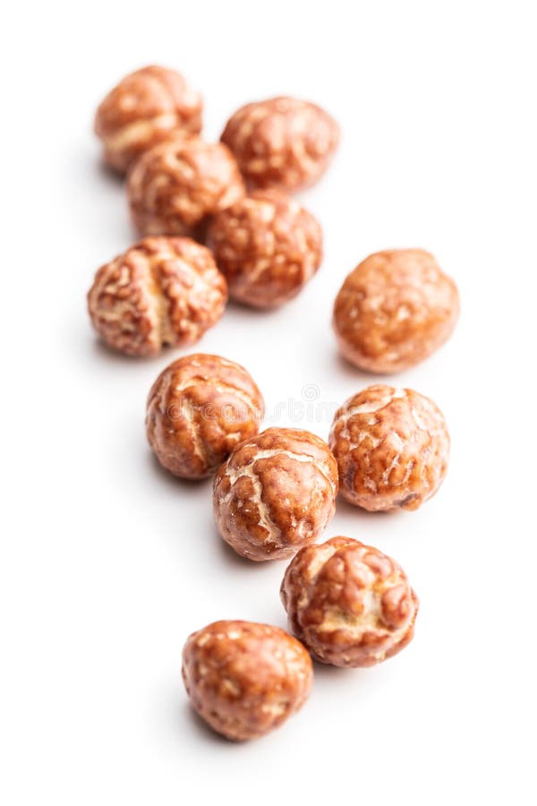 Hazelnuts with sugar icing stock image. Image of object - 175338405