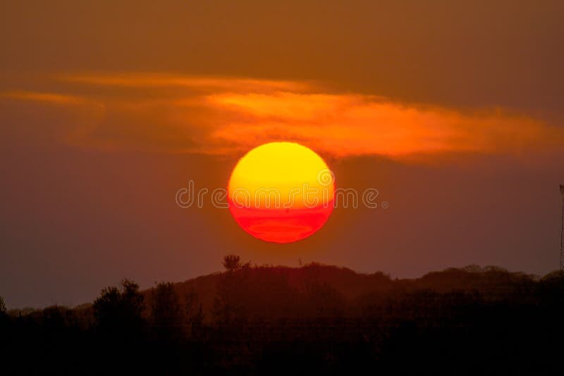 Hazy Sunset Dulling the Sun Stock Image - Image of hazy, dawn: 266613775
