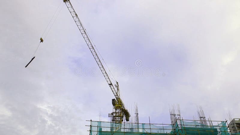 Construction Crane Moving Materials, Heavy Machinery at Work, Building ...