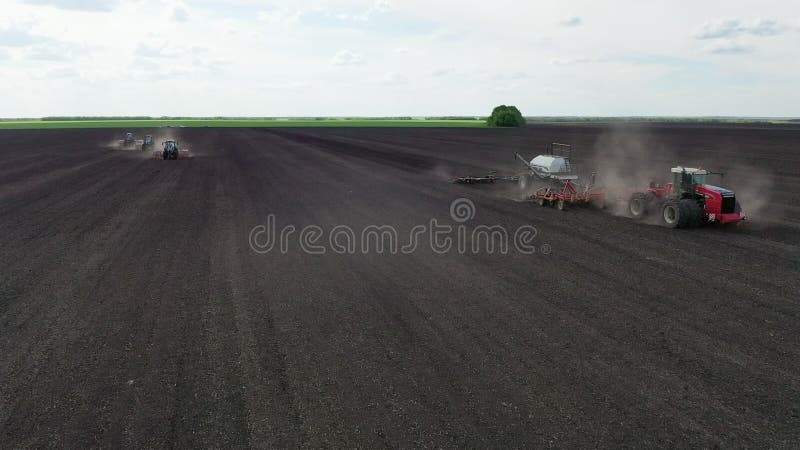 HD. Tractor with a Sowing Complex Works in the Field Stock Video ...
