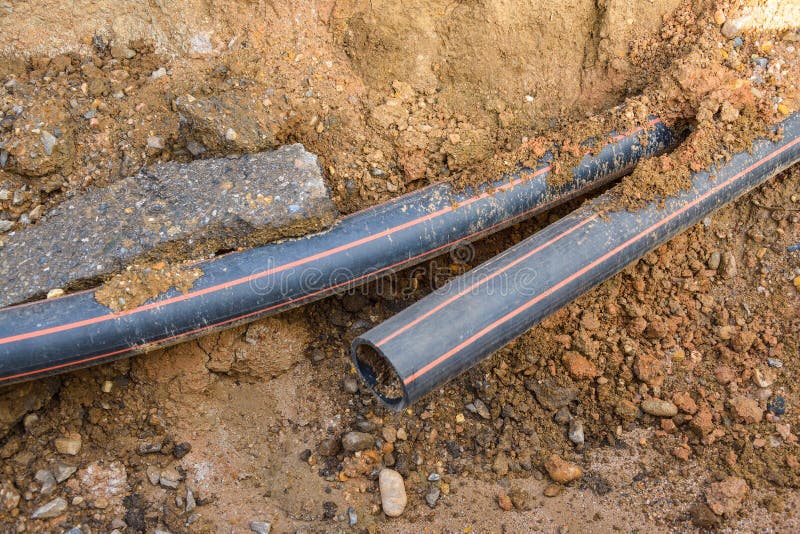 HDPE Pipe at Construction Site. Stock Photo - Image of material, water ...