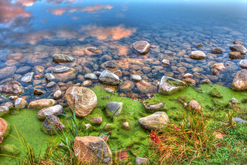HDR of River edge rocks stock image. Image of bright - 45234141