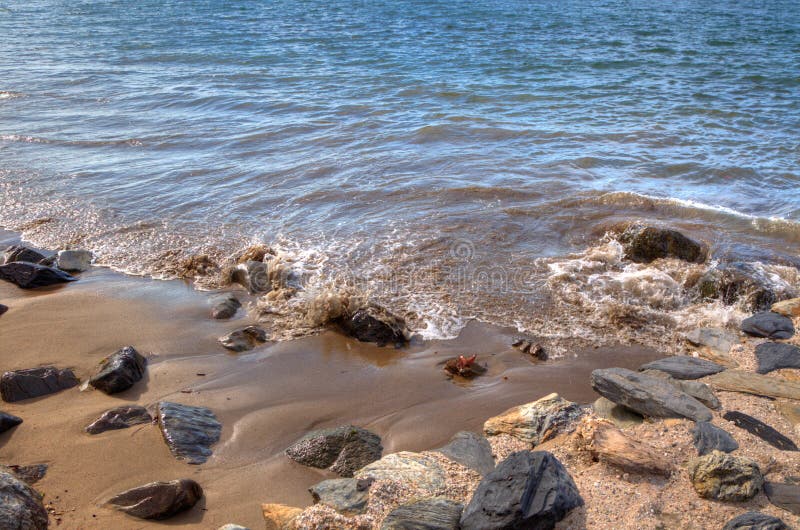 HDR View of Waves Over Rocks Stock Photo - Image of south, sand: 16484444