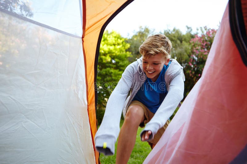 Hea a Happy Camper. a Young Boy Running into His Tent. Stock Photo ...