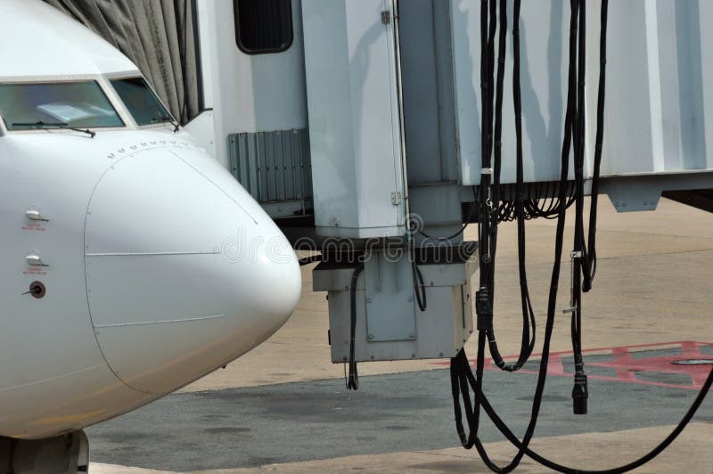 Head of an Airplane and Airport Equipment Stock Photo - Image of ...
