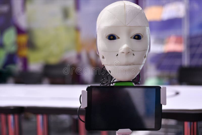 The Head of the Android Robot Communicates with the Person through the ...