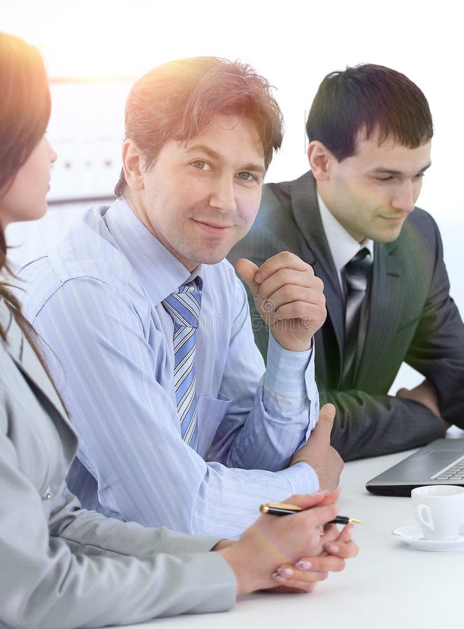 Head of Business Team Sitting at Desk Stock Photo - Image of blank ...