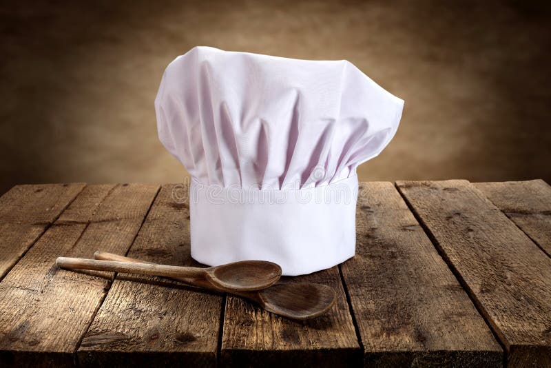 Chef Hat and Wodden Spoons on Wood Stock Photo - Image of color, baker ...