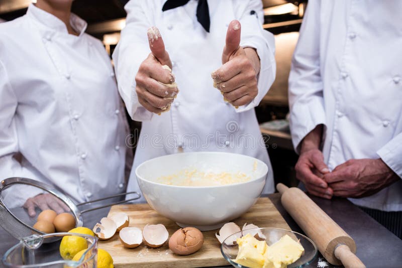 Head Chef Showing Thumbs Up while Preparing Dough Stock Photo - Image ...