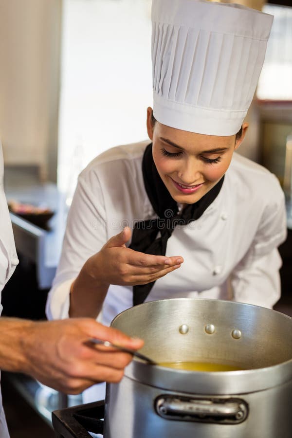 Chef Smelling Food in Commercial Kitchen Stock Image - Image of happy ...