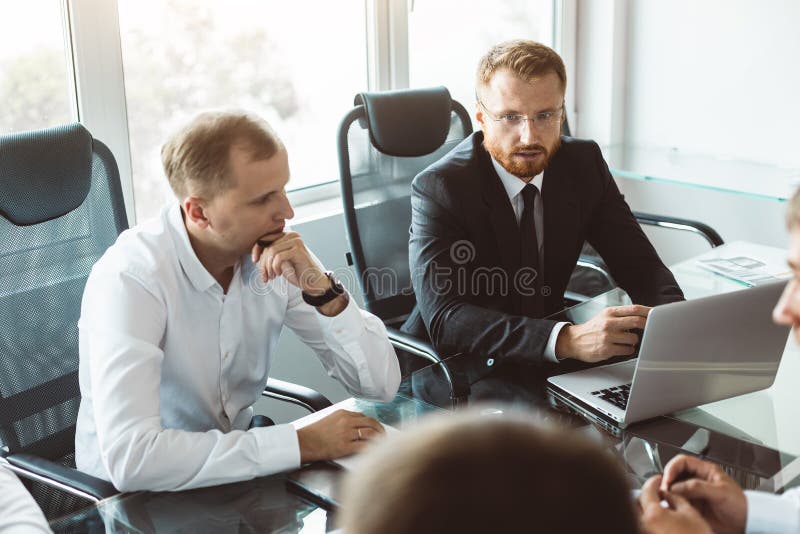 The Head of the Company Sits at the Negotiating Table and Interacts ...